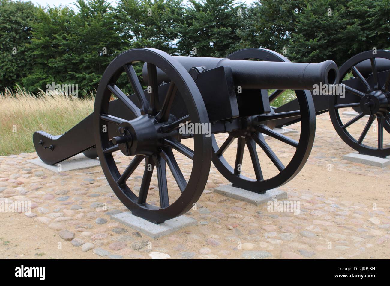 Black cannon shot by canon Stock Photo - Alamy