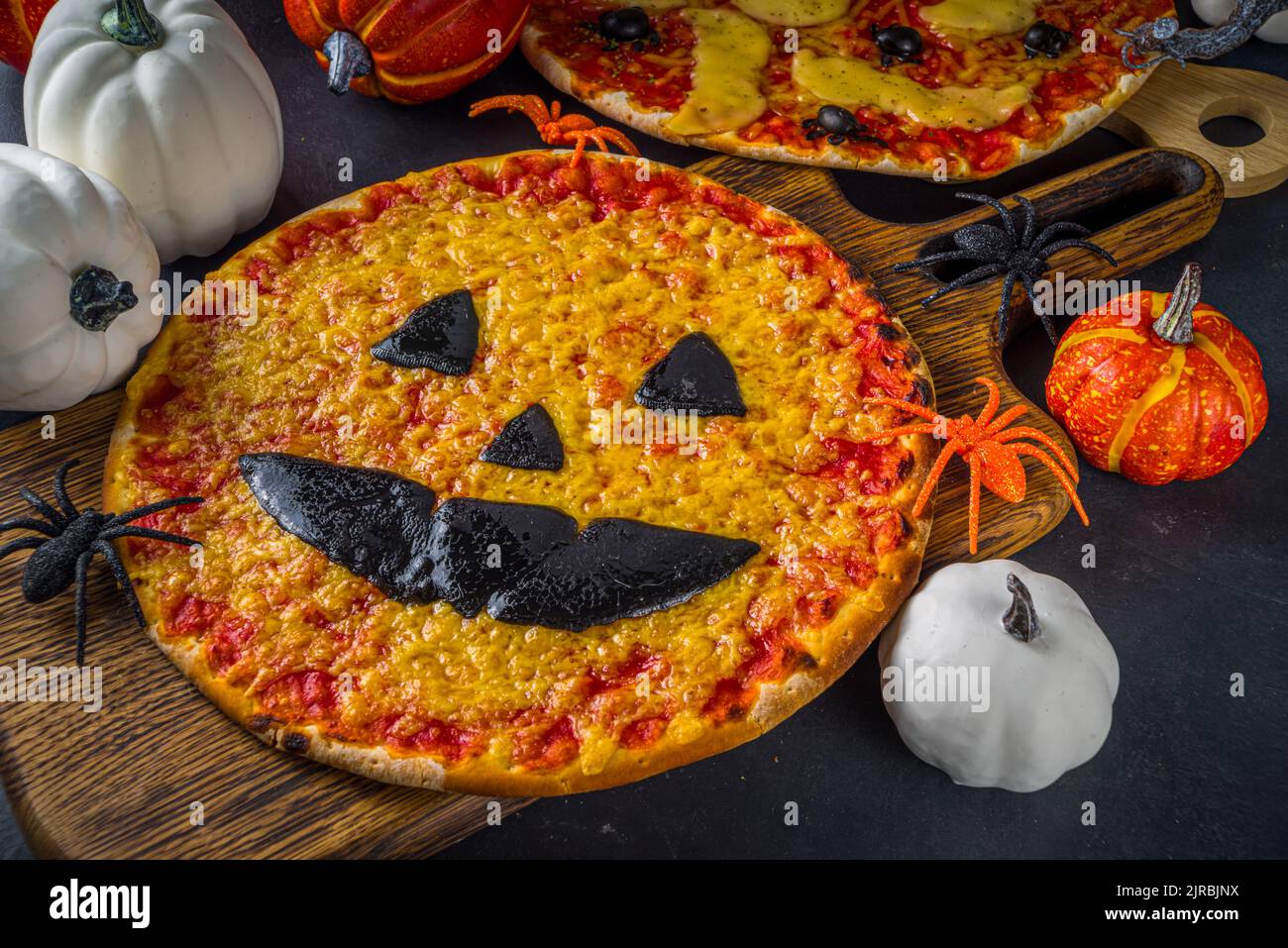 Halloween party trick or treat food, funny scary pizza in the style of ...