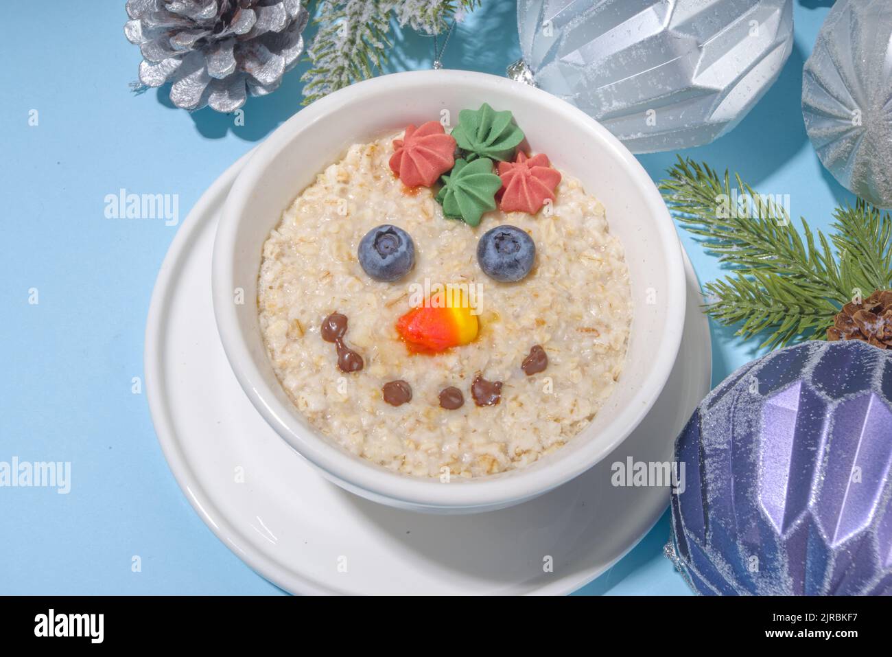 Christmas morning breakfast - oatmeal porridge decorated like a snowman ...