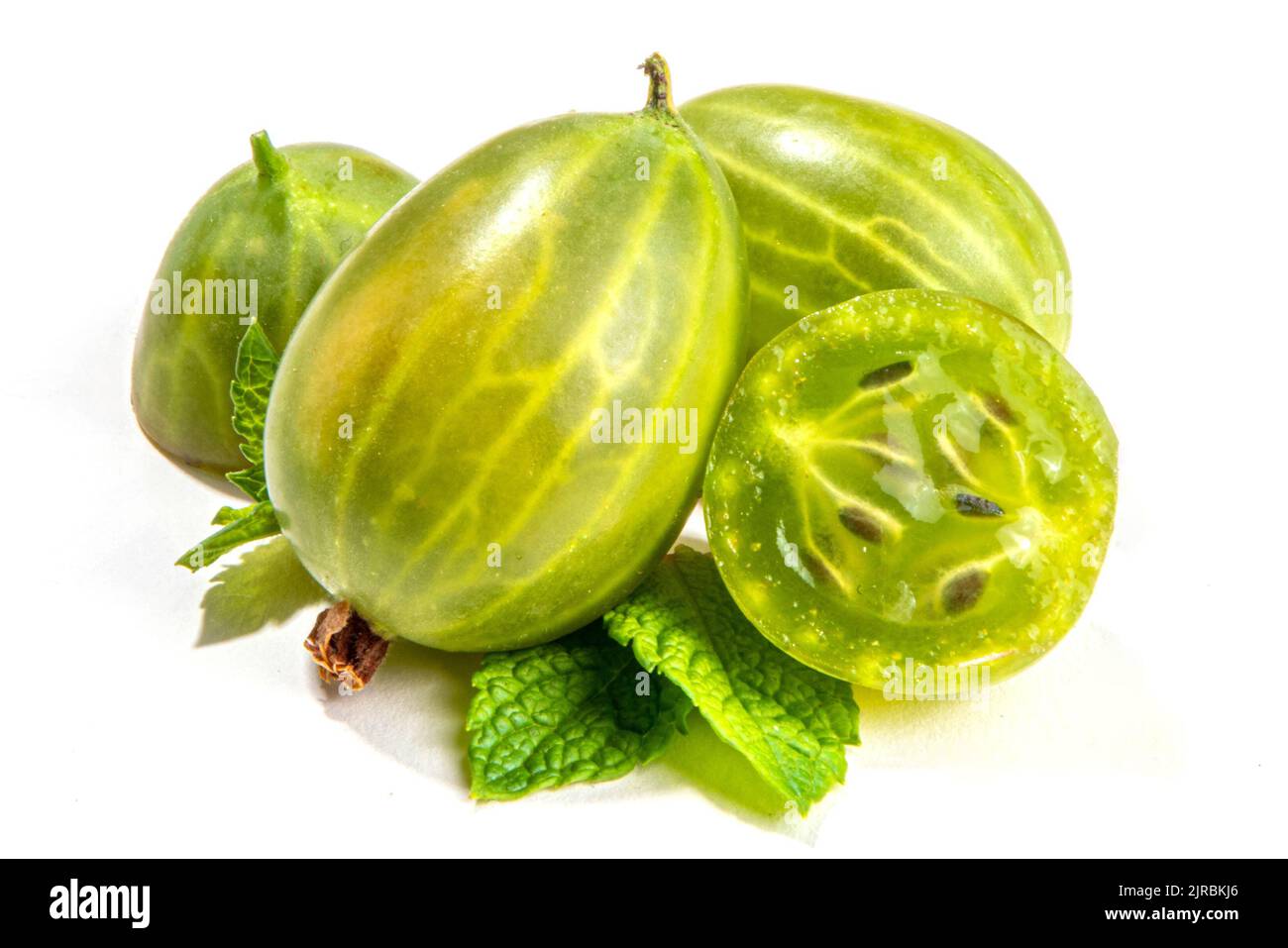 Fresh ripe raw green gooseberry, group of whole and half gooseberries ...