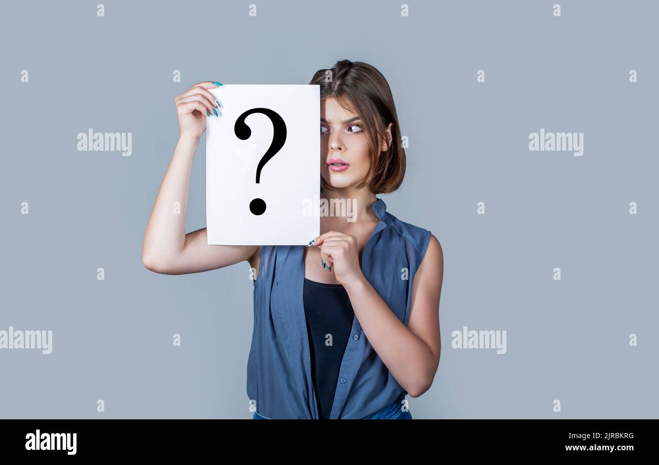 Woman with doubtful expression and question marks. Question mark ...