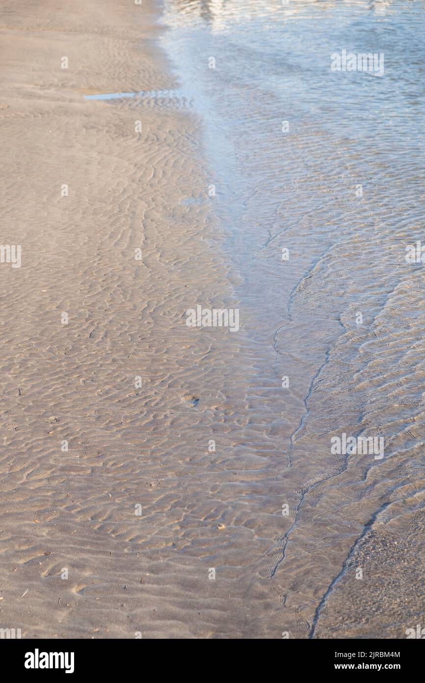 Sea tide waves, natural sand and water texture. Smooth sand background ...