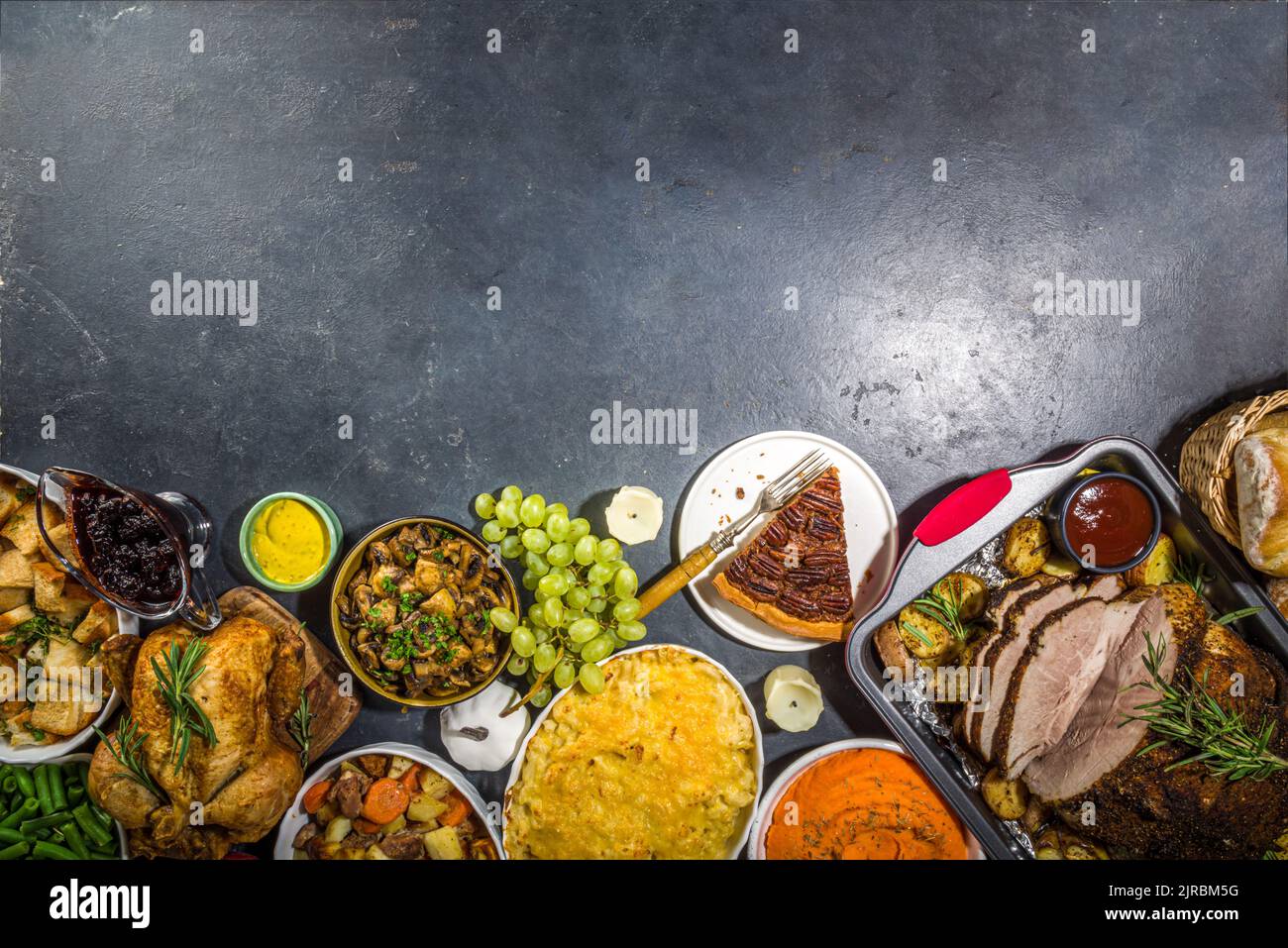 Thanksgiving dinner table with new traditional thanksgiving food ...