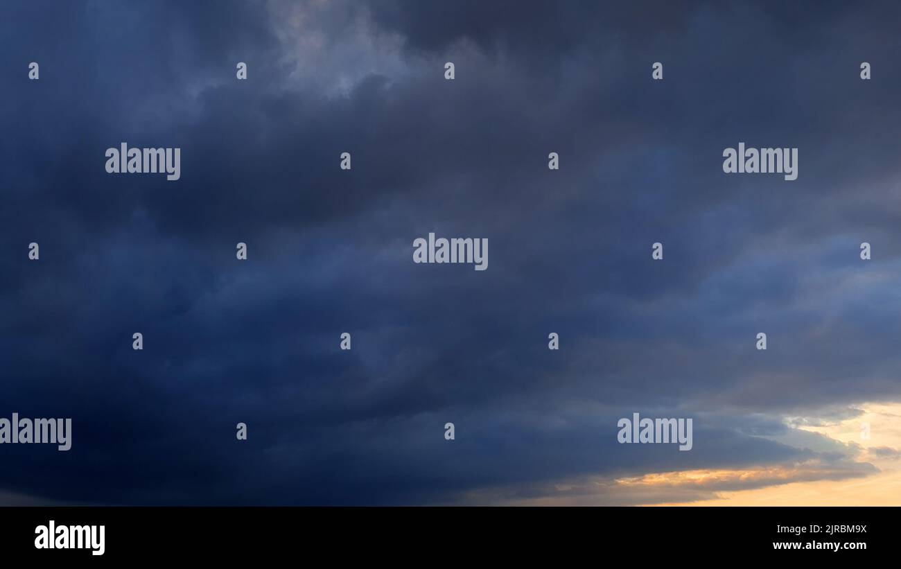 heavy dark rain storm clouds backdrop for weather forecast - abstract ...