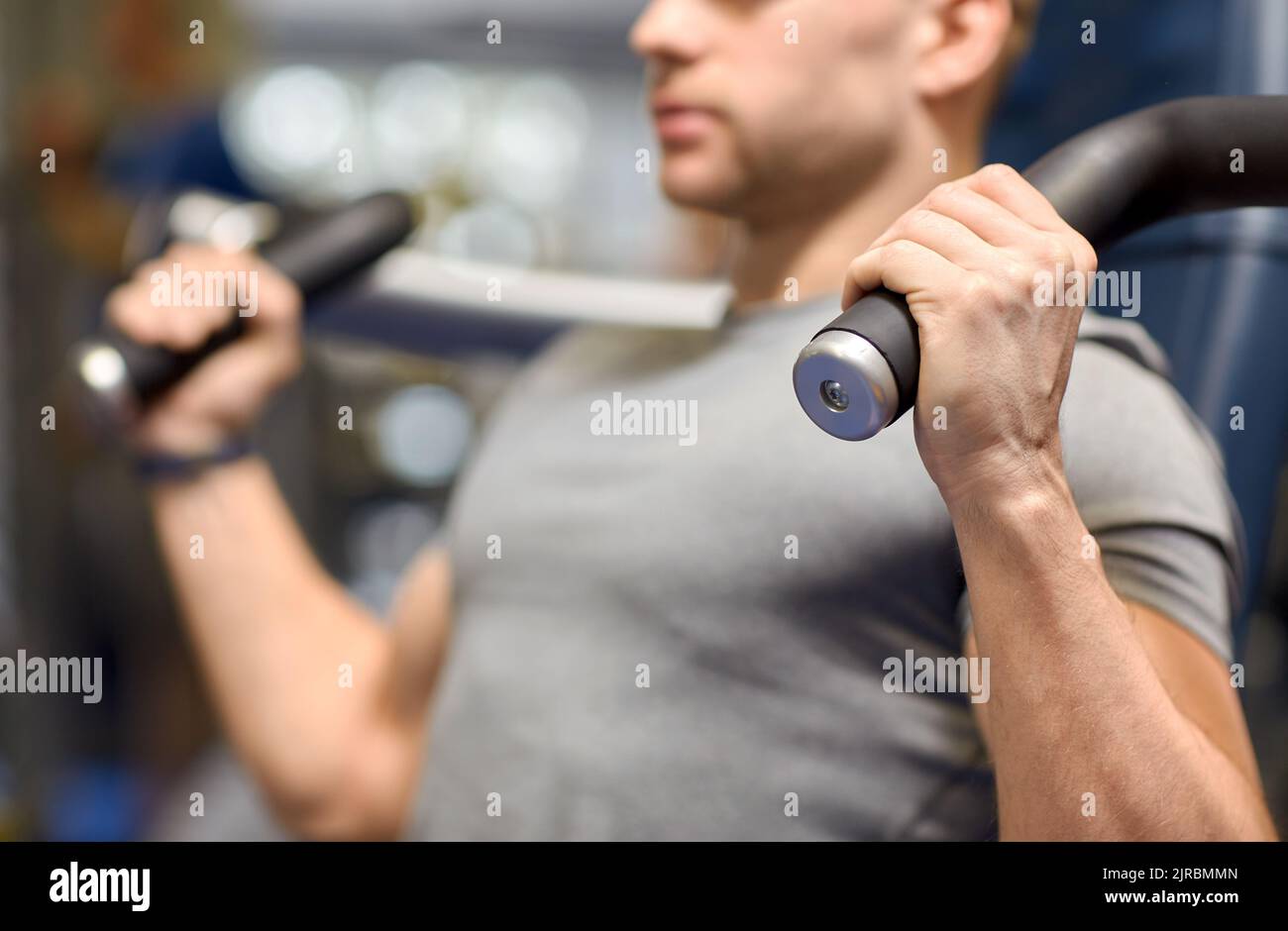 smiling man exercising in gym Stock Photo - Alamy