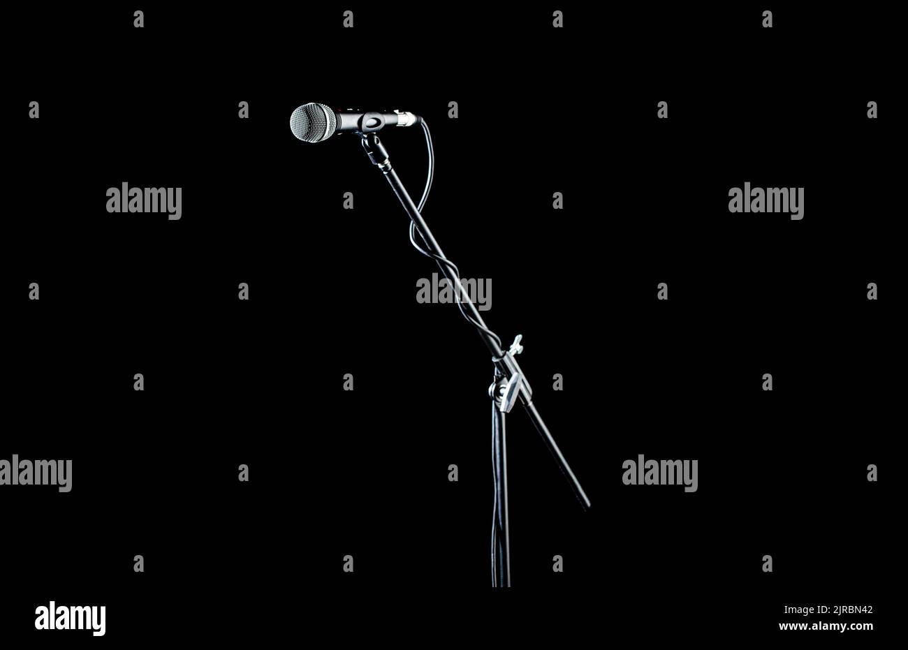 Vocal audio mic on a black background. Singer in karaokes, microphones ...