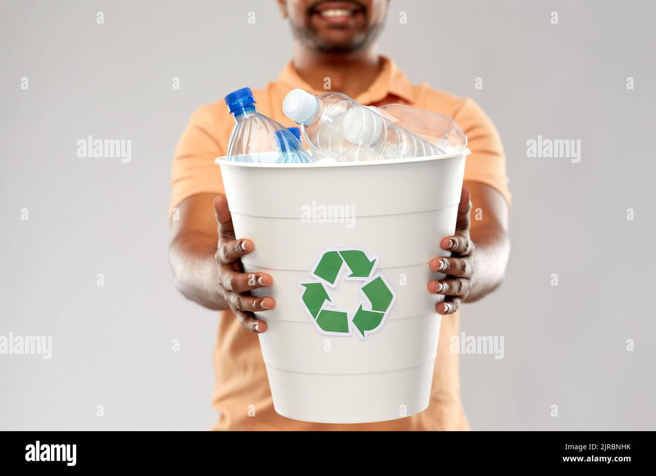 close up of young indian man sorting plastic waste Stock Photo - Alamy