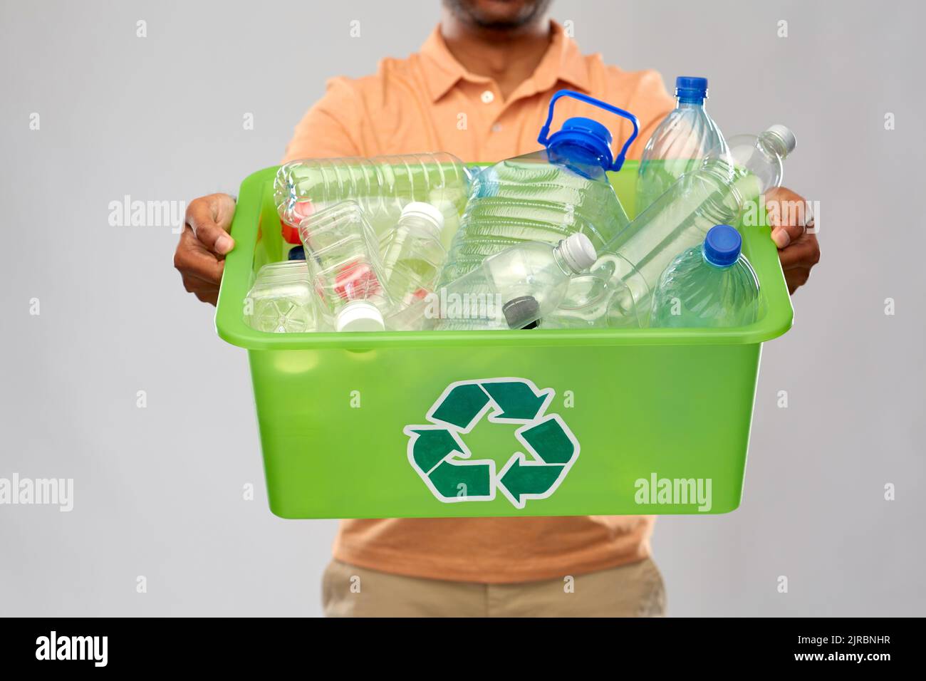 close up of young man sorting plastic waste Stock Photo - Alamy