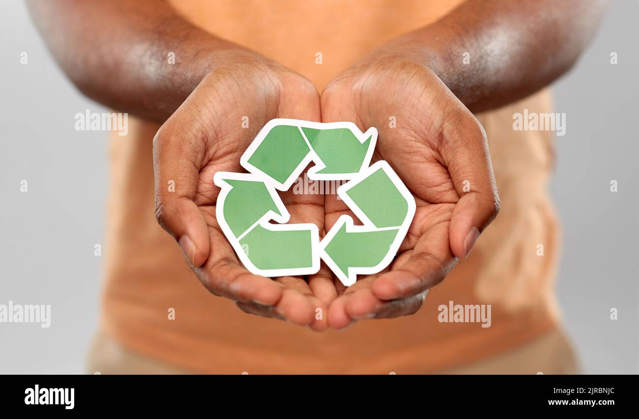 Man holding recycling sign hi-res stock photography and images - Alamy