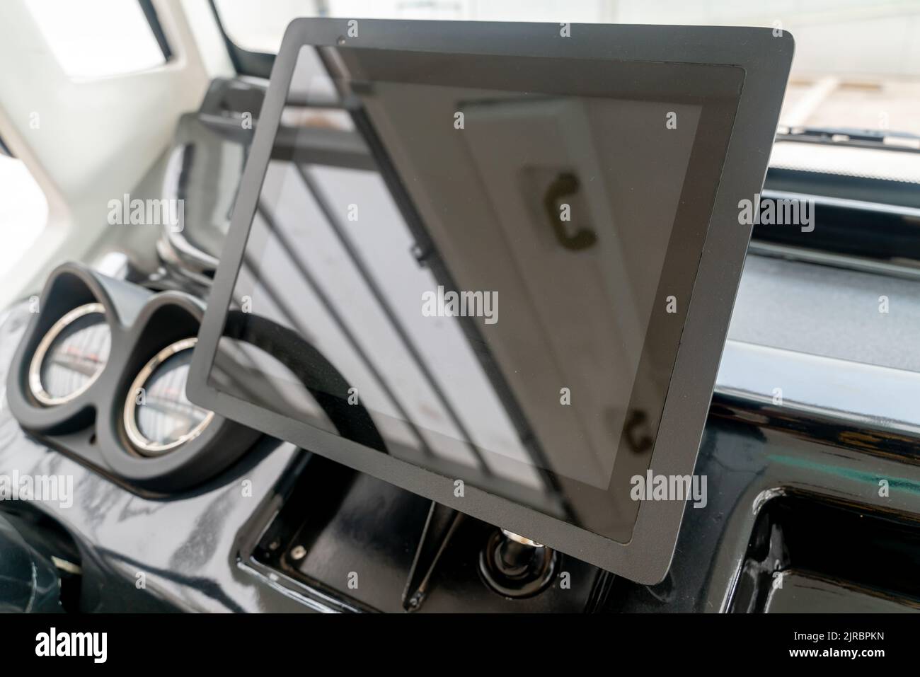 An autonomous vehicle interior with touch screen and auto navigation ...