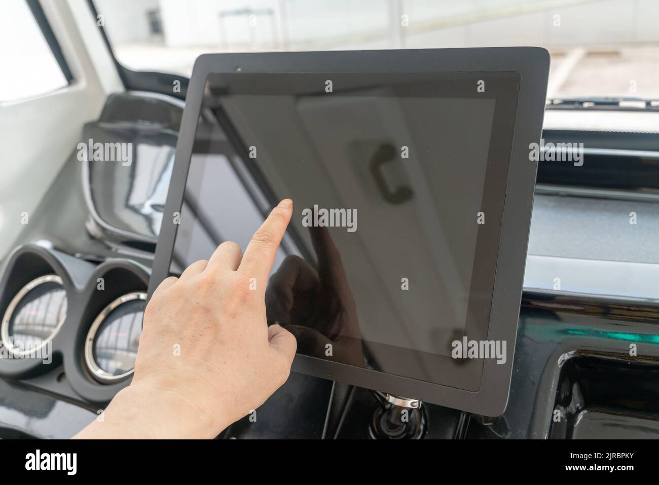 An autonomous vehicle interior with touch screen and auto navigation ...