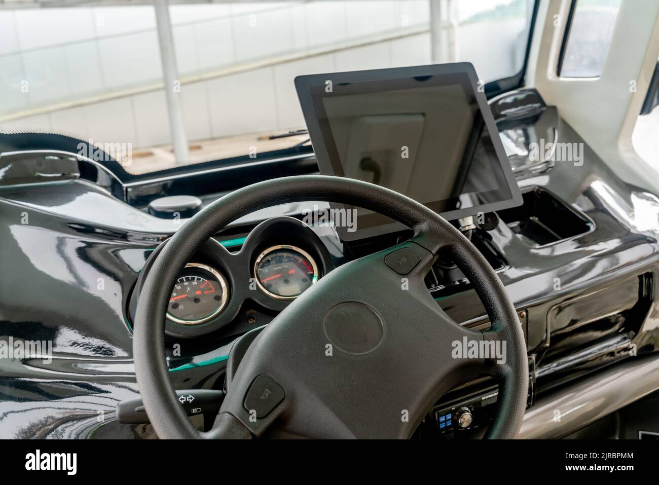 An autonomous vehicle interior with touch screen and auto navigation ...