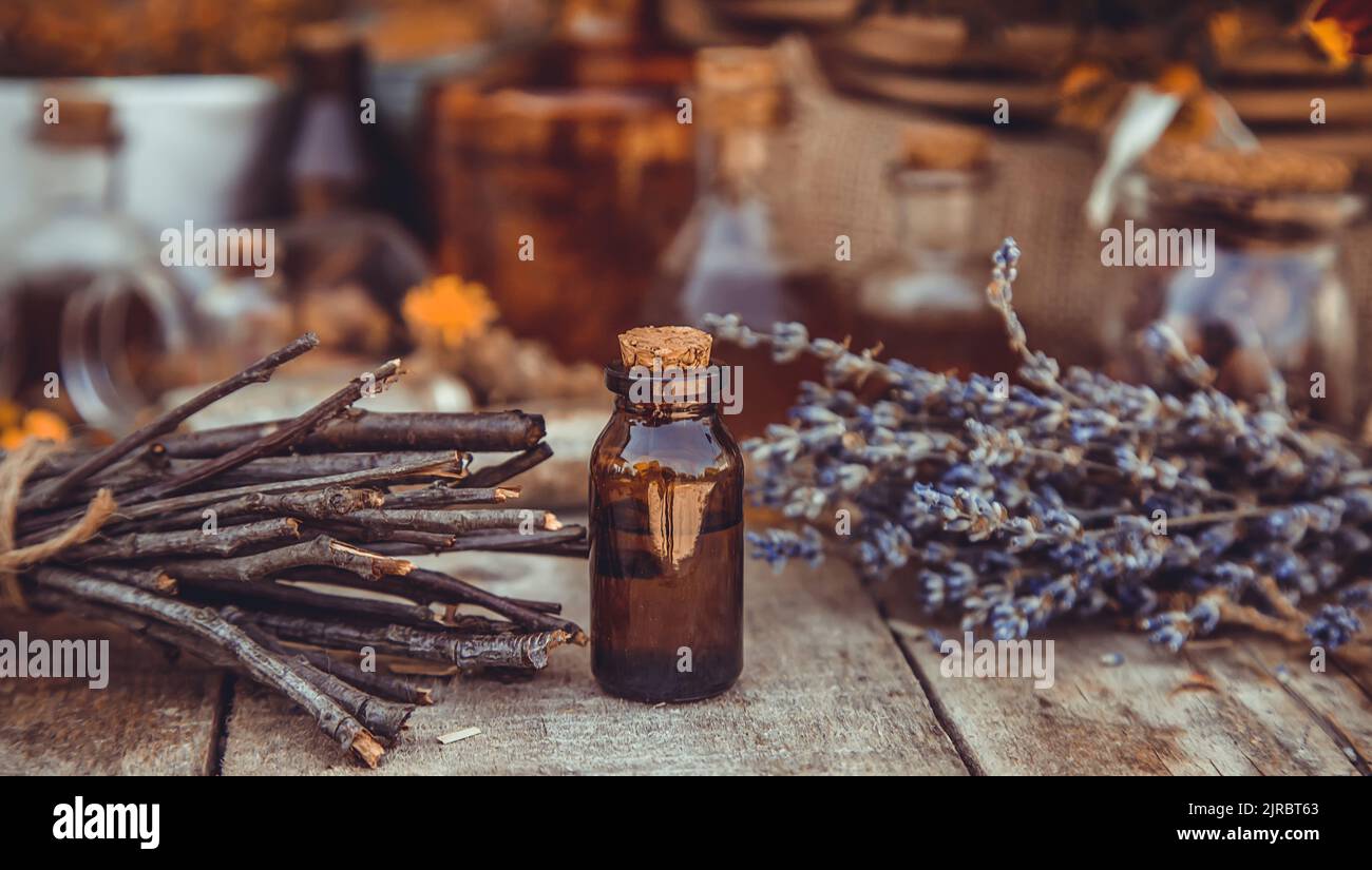 Medicinal herbs and tinctures homeopathy. Selective focus Stock Photo ...
