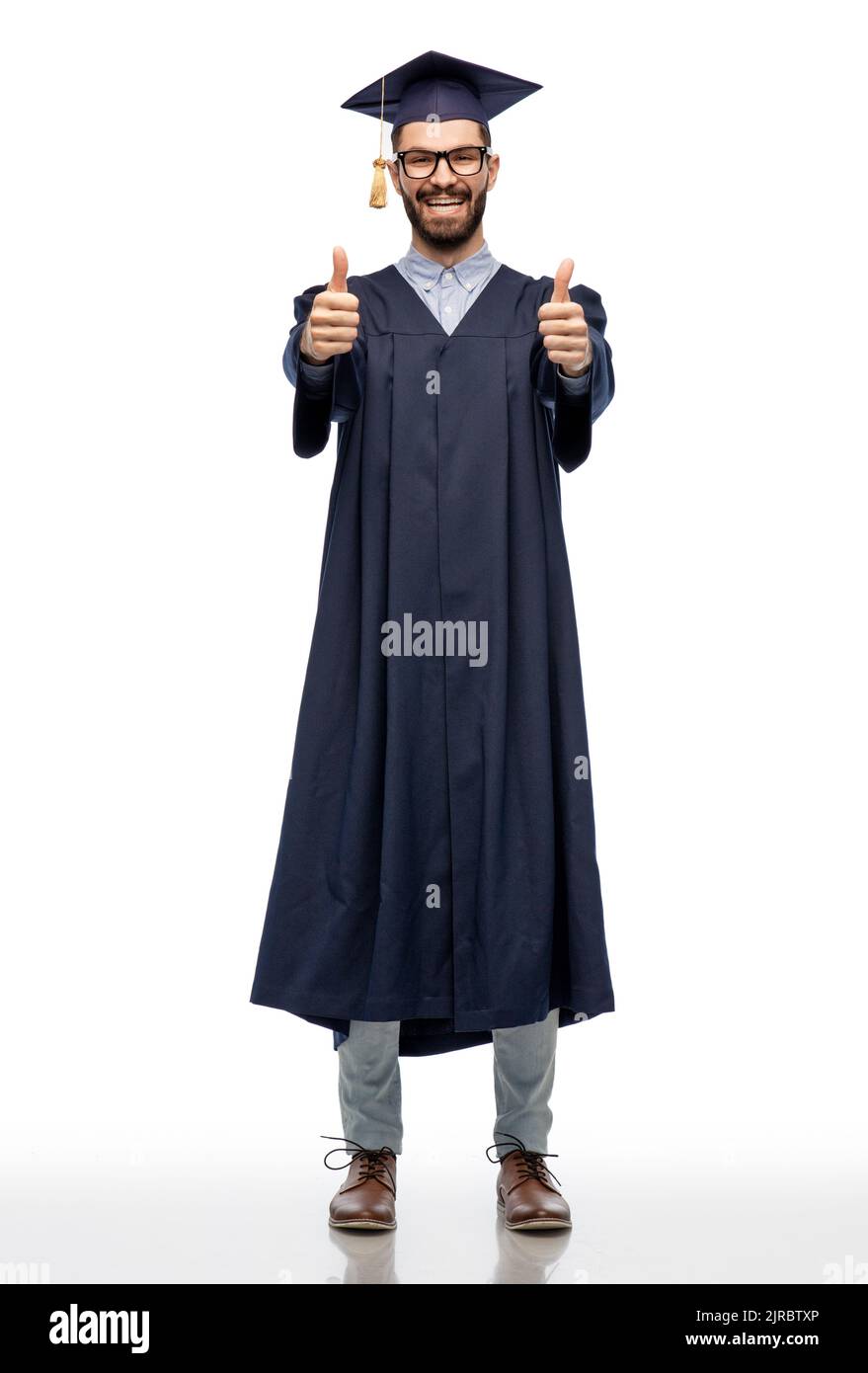 happy male graduate student showing thumbs up Stock Photo - Alamy