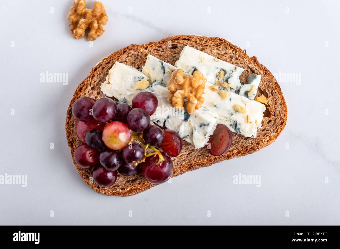 Toast with blue cheese and grapes Stock Photo - Alamy