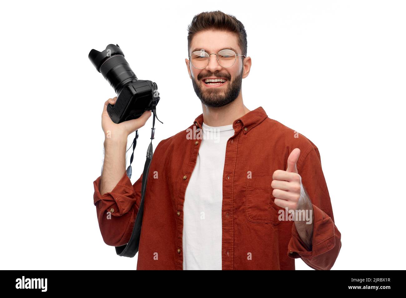man or photographer with camera showing thumbs up Stock Photo - Alamy