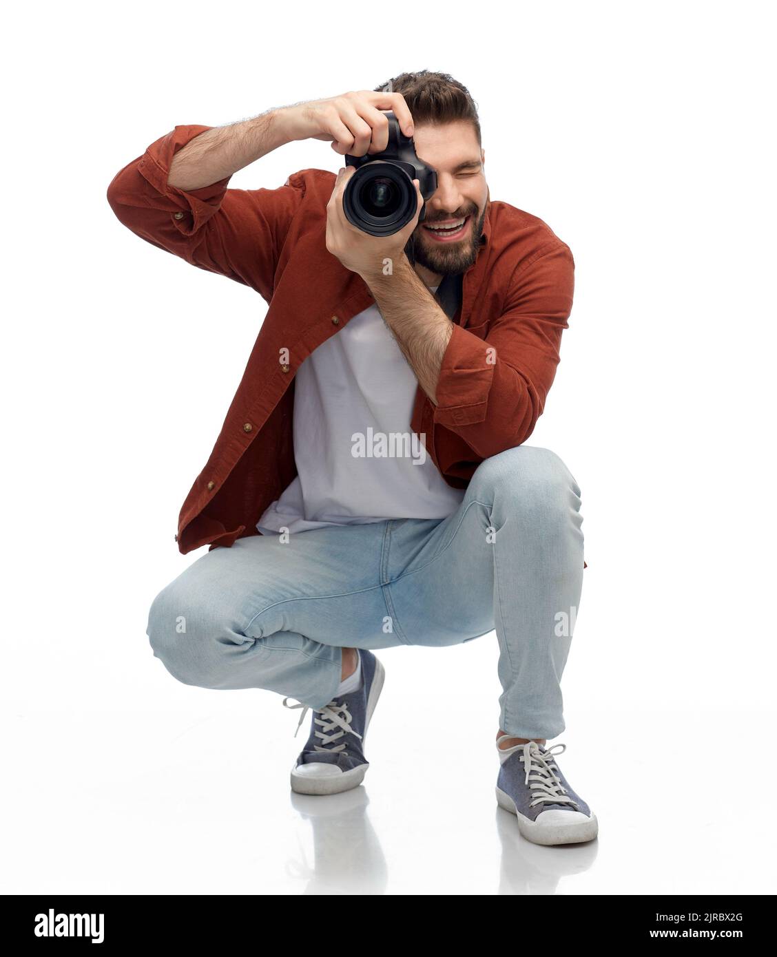 Female photographer taking picture Cut Out Stock Images & Pictures - Alamy