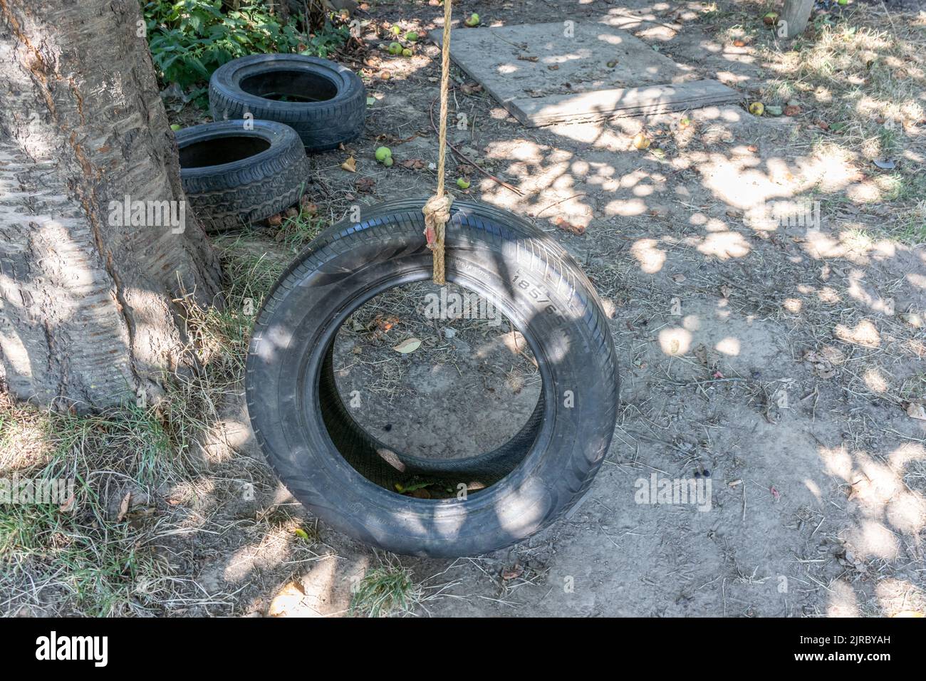 Swing made from old tire hi-res stock photography and images - Alamy