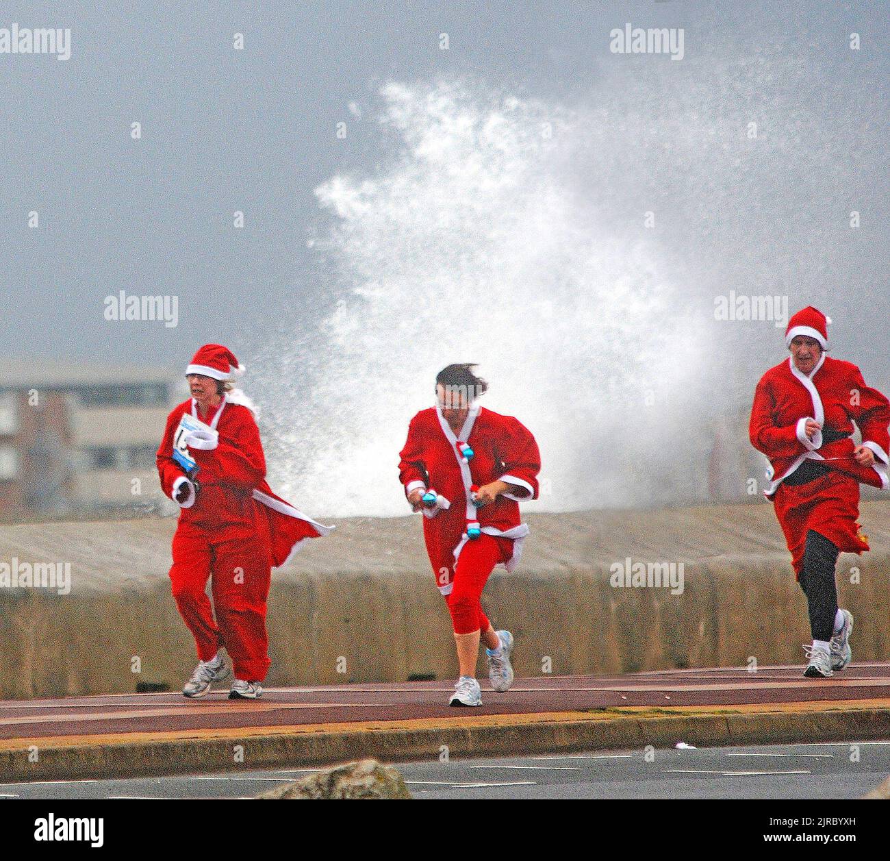 WAVES AND SPRAY BATTER HUNDREDS OF RUNNERS WHO BRAVED THE ELEMENTS IN THE ANNUAL RNLI SANTA 10K ...