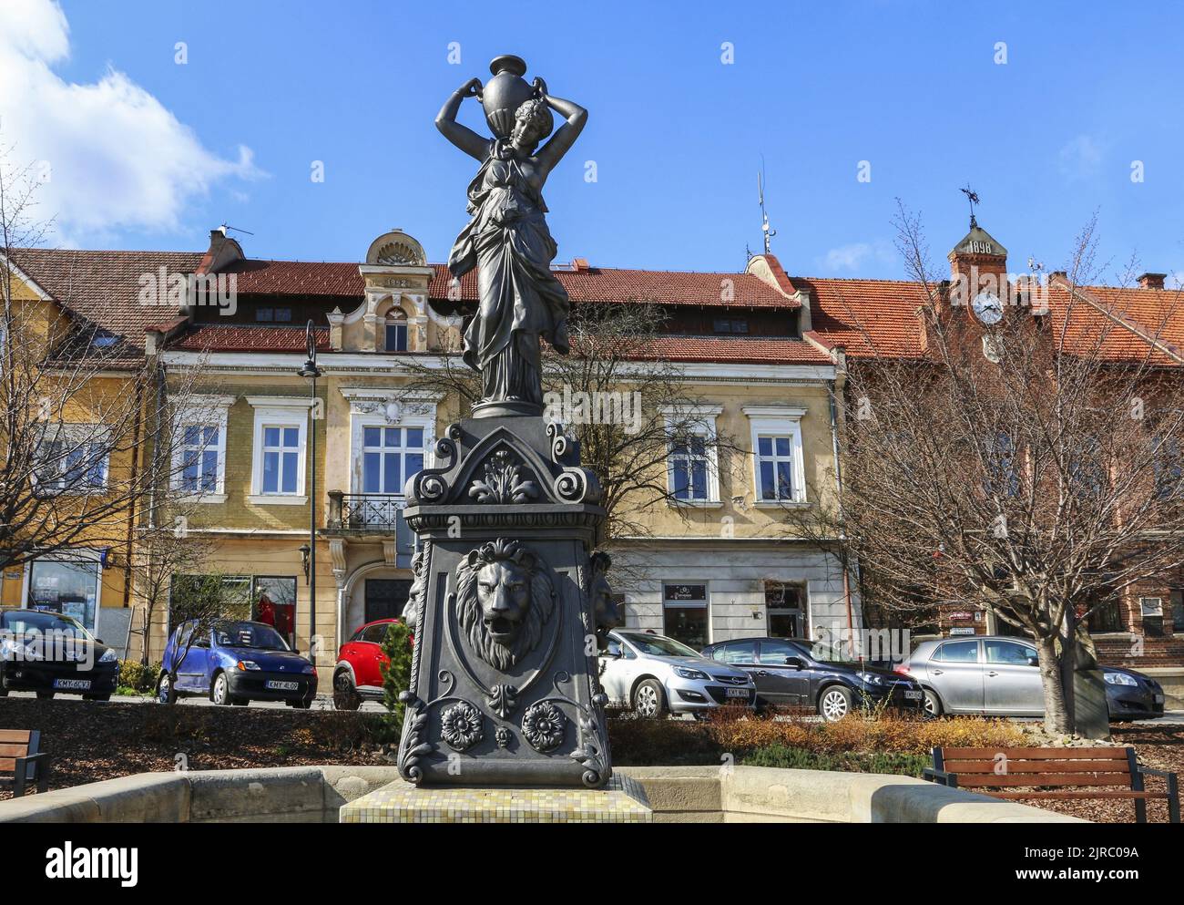 The fountain on the main market square in Myslenice, Poland Stock Photo ...