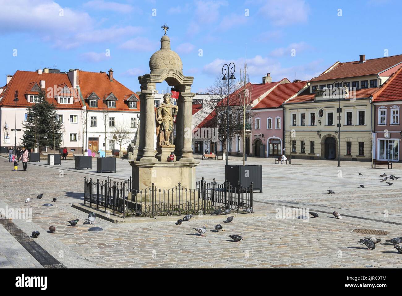The monument on the main market square in Myslenice, Poland Stock Photo ...