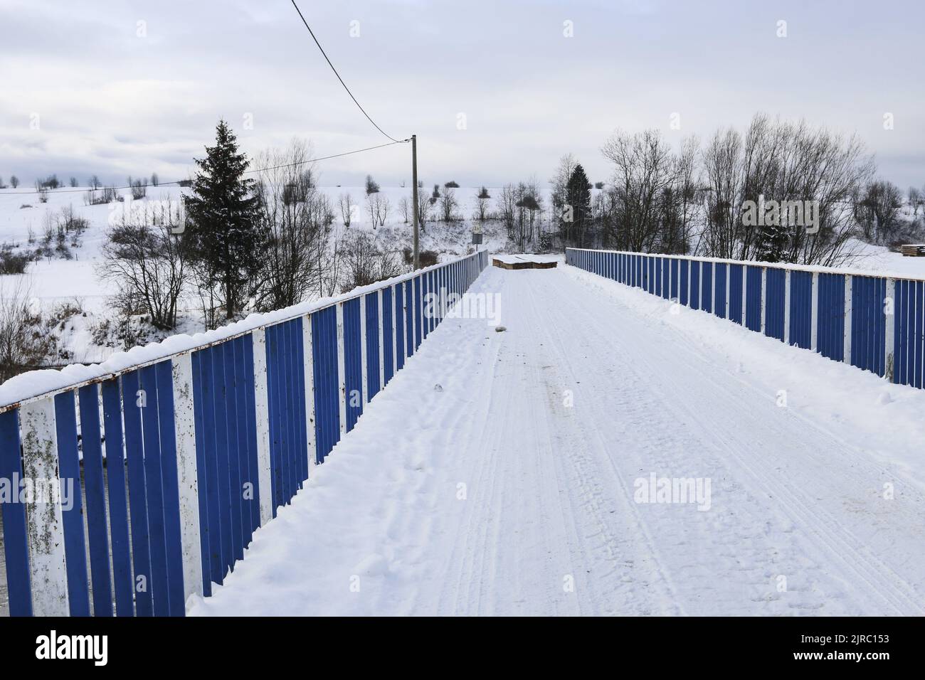 ZAKOPANE, POLAND - JANUARY 28, 2021: A bridge covered with snow. Winter ...
