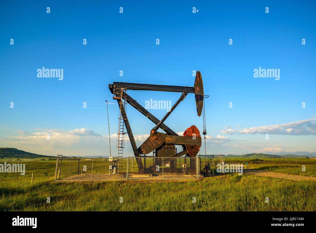 A Lufkin Mark II advanced-geometry pump jack pumping crude oil from a ...