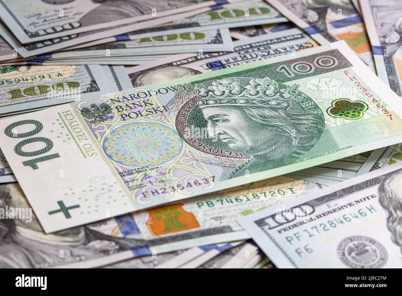 100 US dollar and 100 polish zloty banknotes for design purpose Stock ...