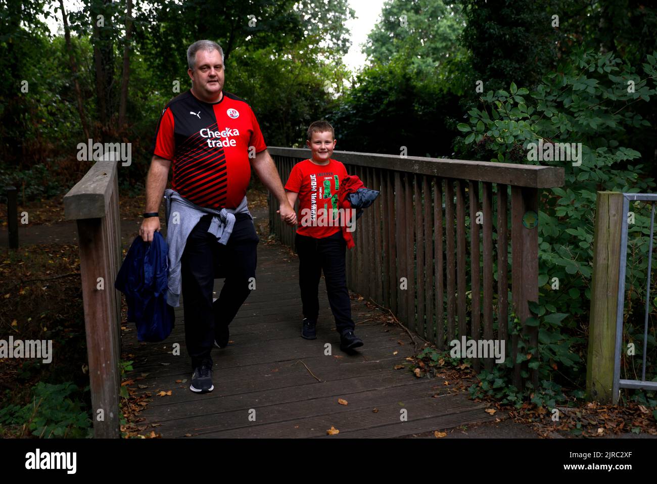 Crawley Town fans make their way to the stadium ahead of the Carabao ...