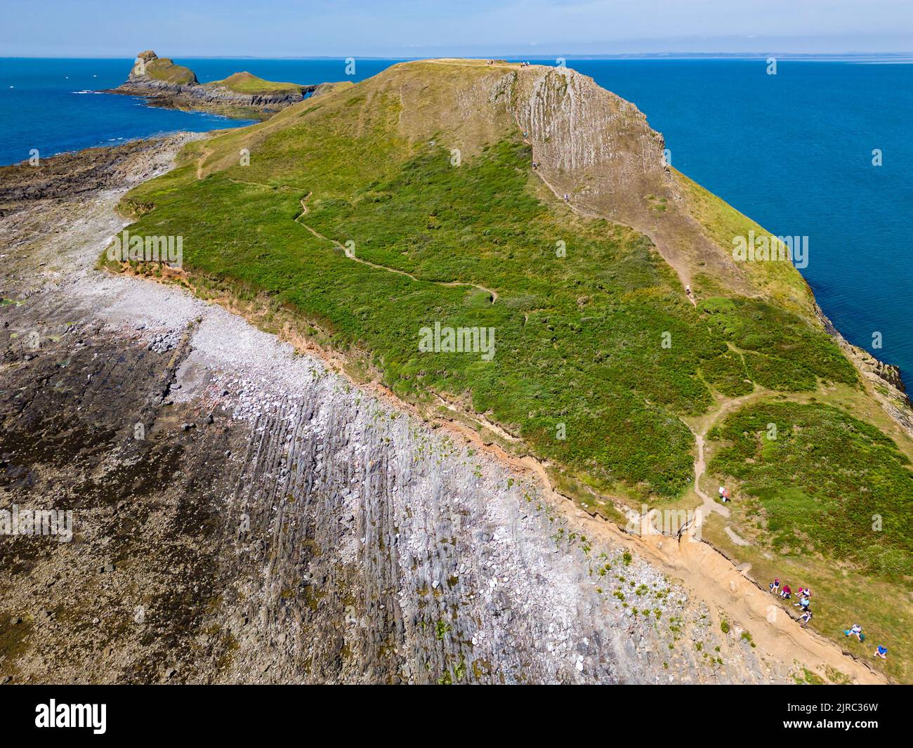 Aerial view of Worm's Head on the coast of Wales at low tide (Rhossili ...