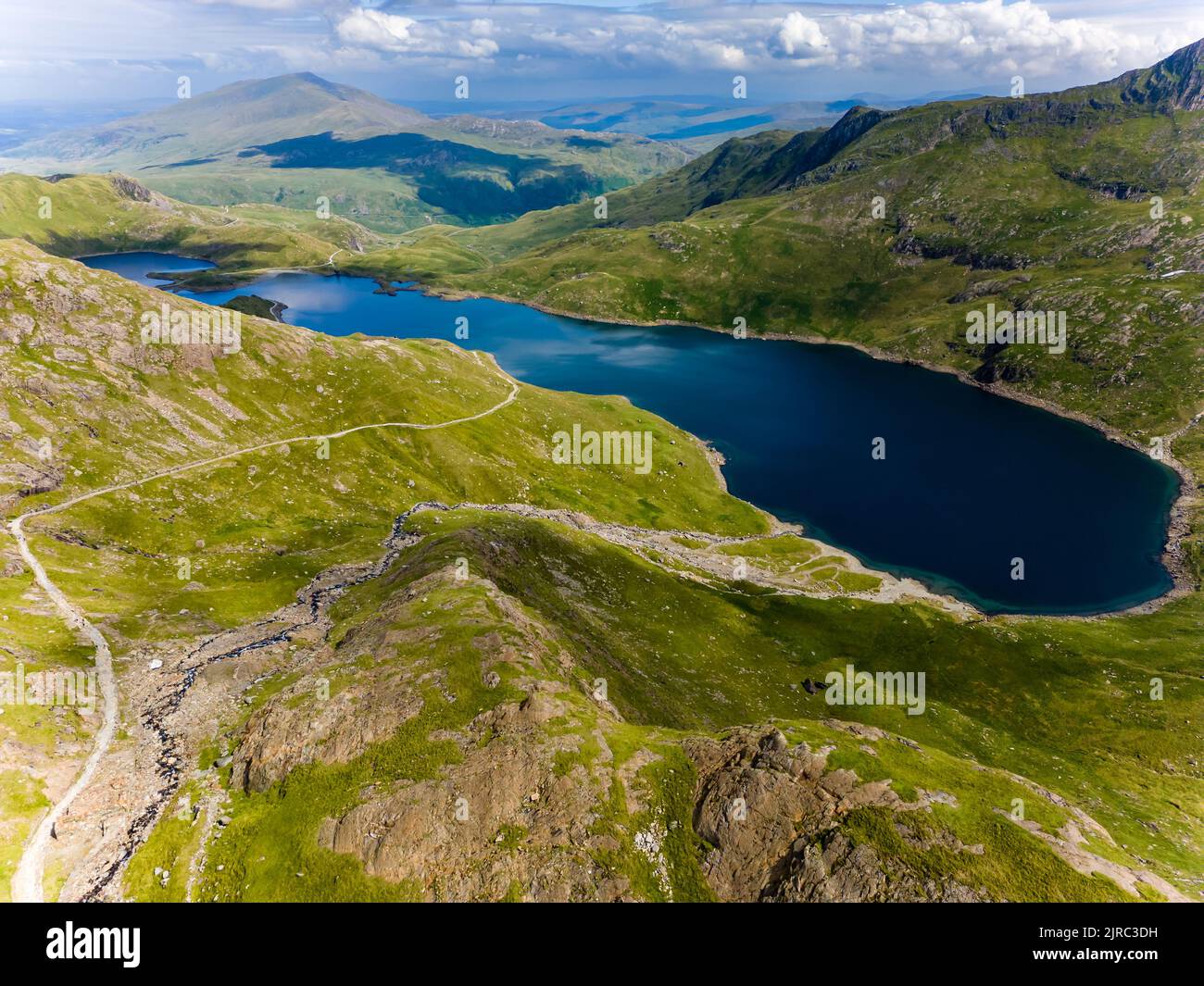 Aerial view of a beautiful mountain lack on the flanks of Mount Snowdon ...