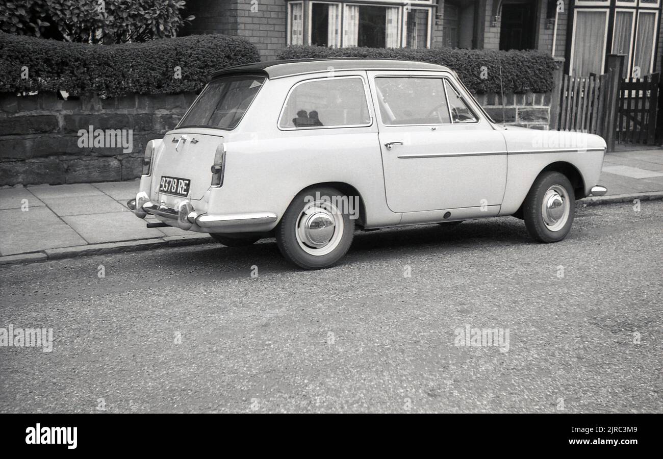 1960s, historical, An Austin A40 parked in a suburban street, England ...