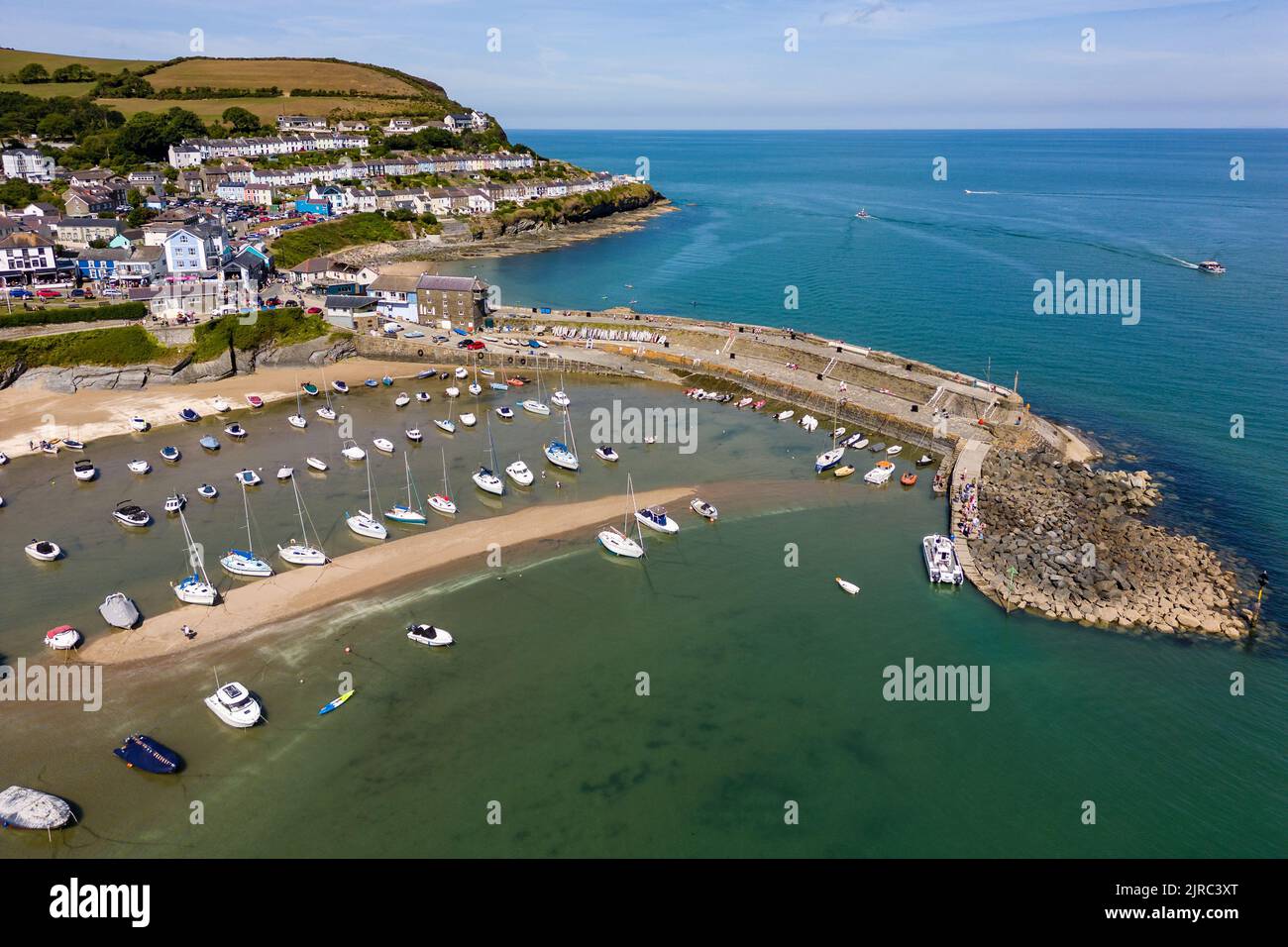Aerial view of boats in the harbour at low tide in the Welsh seaside ...