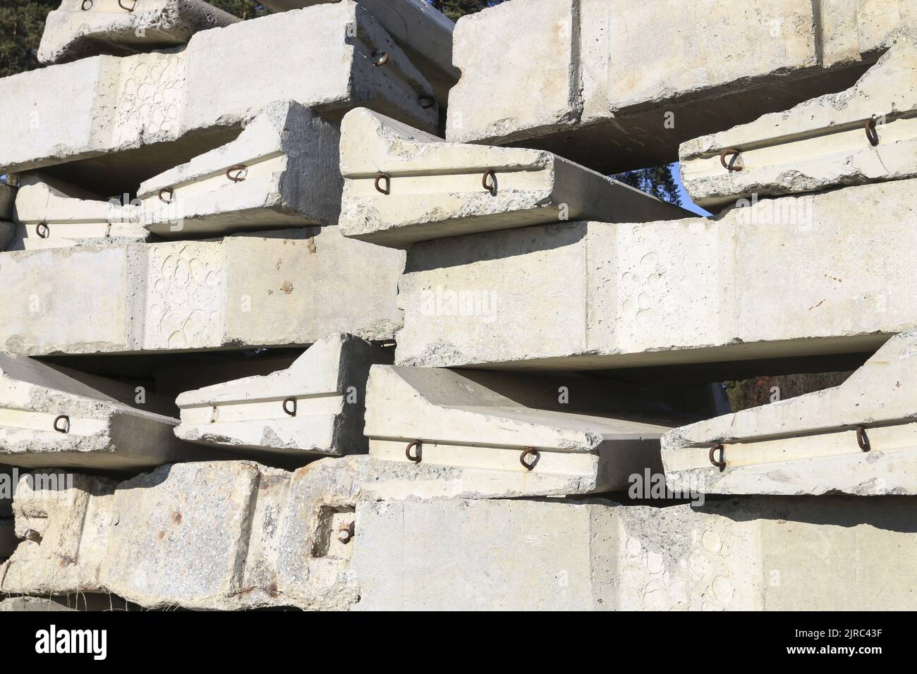 A pile of concrete building elements. A metaphor for the ubiquity of ...