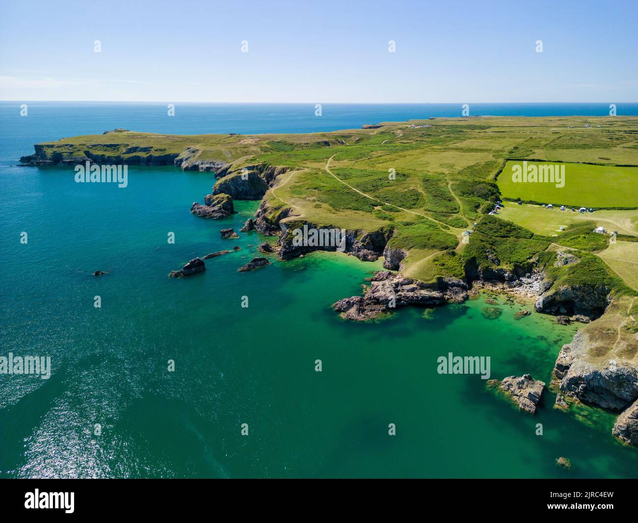 Aerial view of the rocky Welsh coastline near Broad Haven South ...