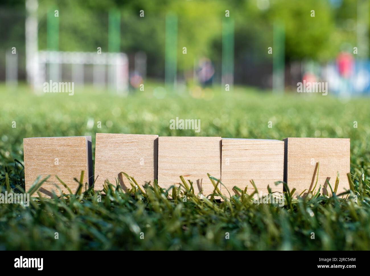 Five wooden football field cubes, mocap Stock Photo - Alamy