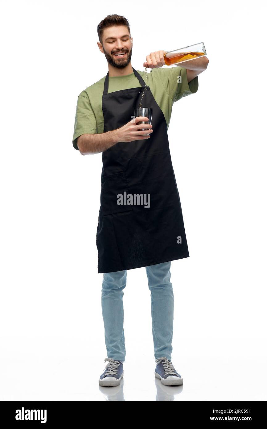 Barman pouring whiskey glass Cut Out Stock Images & Pictures - Alamy