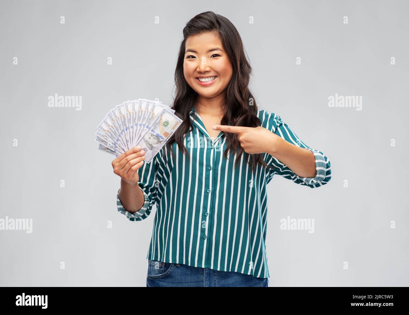 asian woman with hundred dollar money banknotes Stock Photo - Alamy