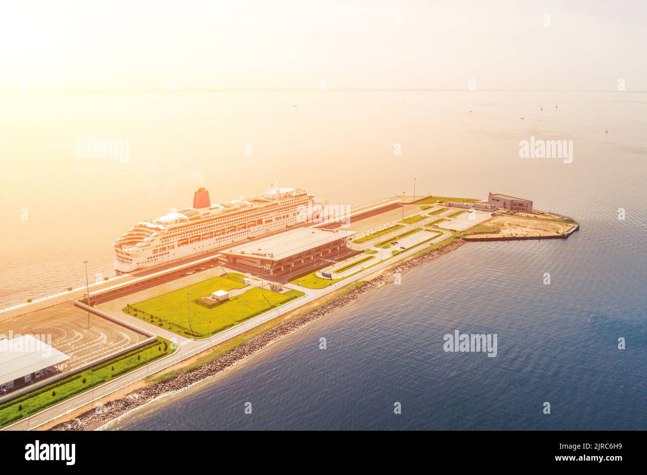 Passenger port with two cruise liners, preparing for departure on a ...