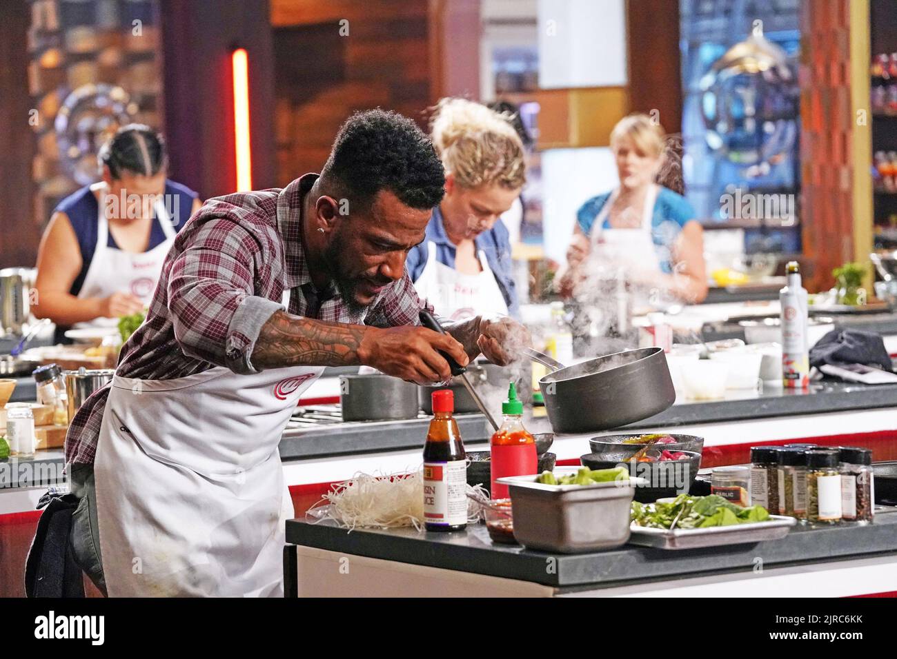 MASMASTERCHEF, contestants Christian Green (front), Brandi Mudd (middle ...