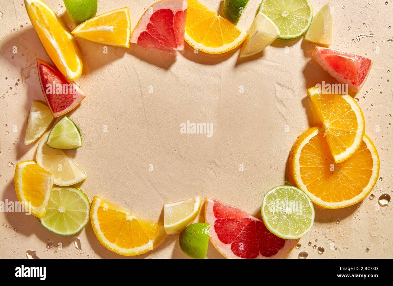 frame of slices of different citrus fruits Stock Photo - Alamy