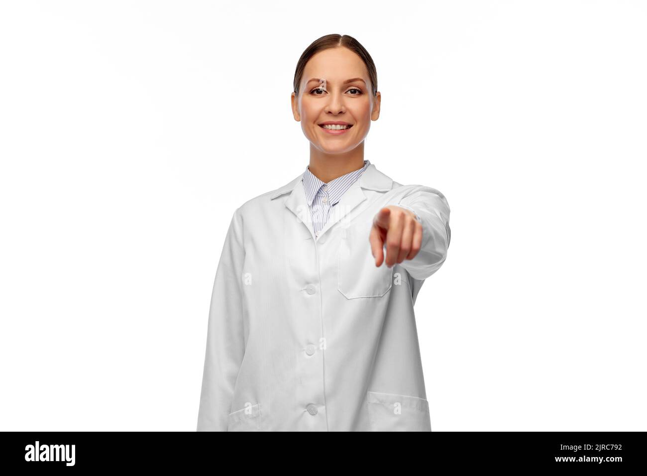 happy female doctor pointing to camera Stock Photo - Alamy