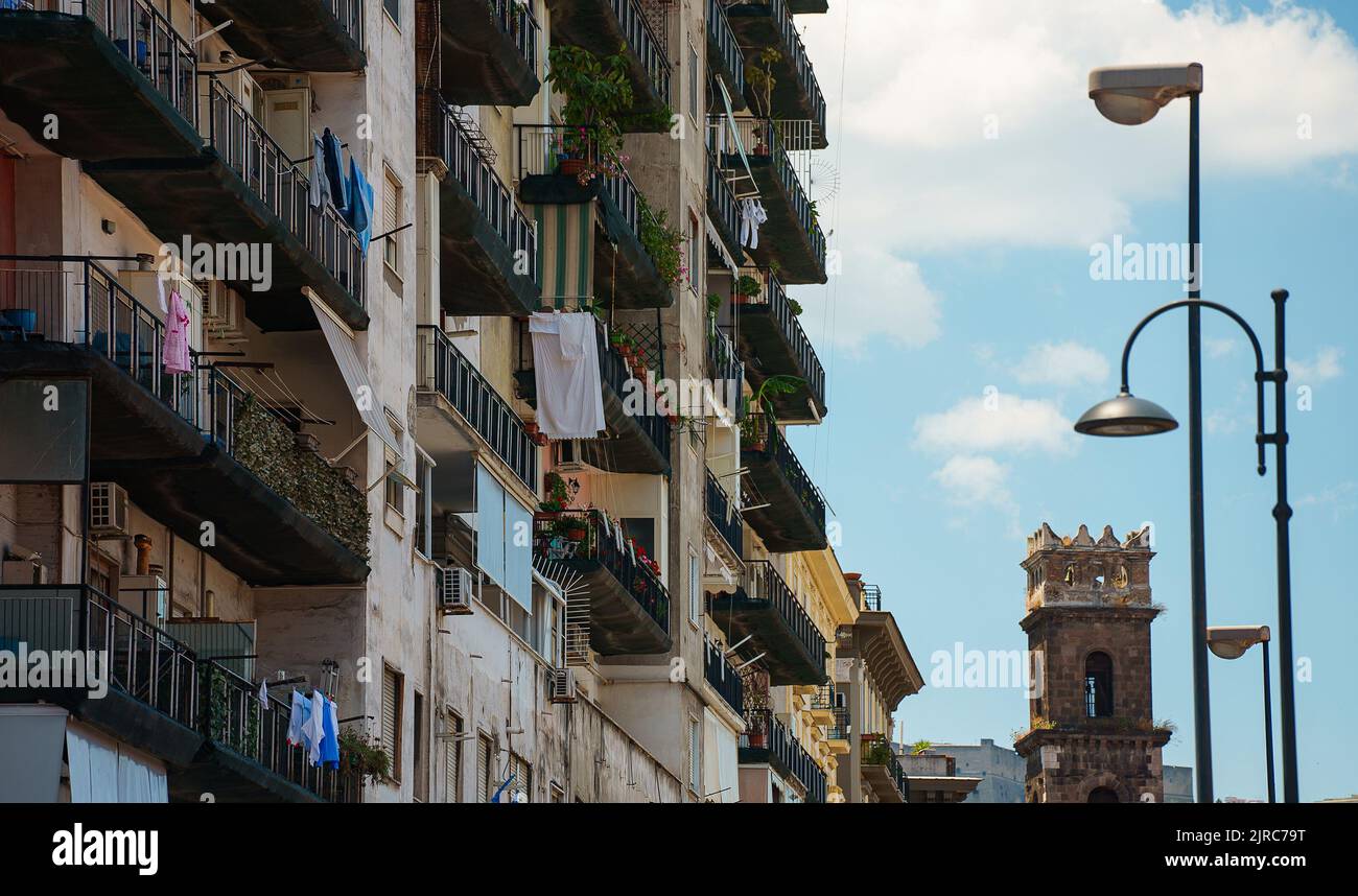 Italian apartment building with balconies and windows Stock Photo - Alamy