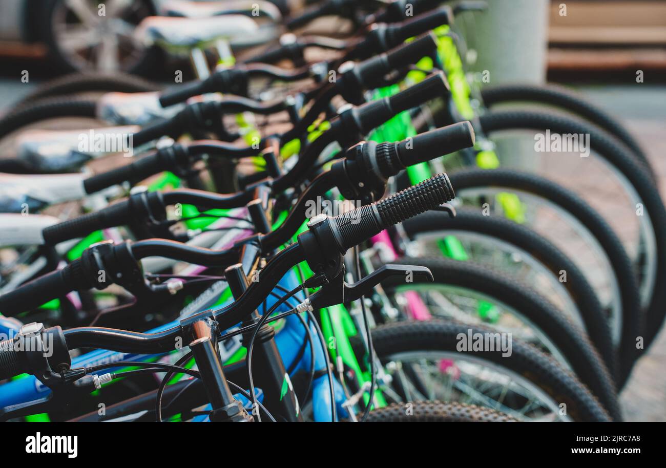 Bicycles on the street. Bike rental service Stock Photo - Alamy