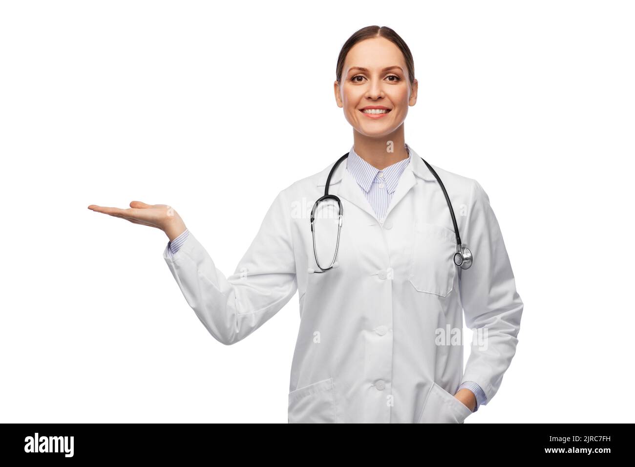 happy female doctor holding something on her hand Stock Photo - Alamy