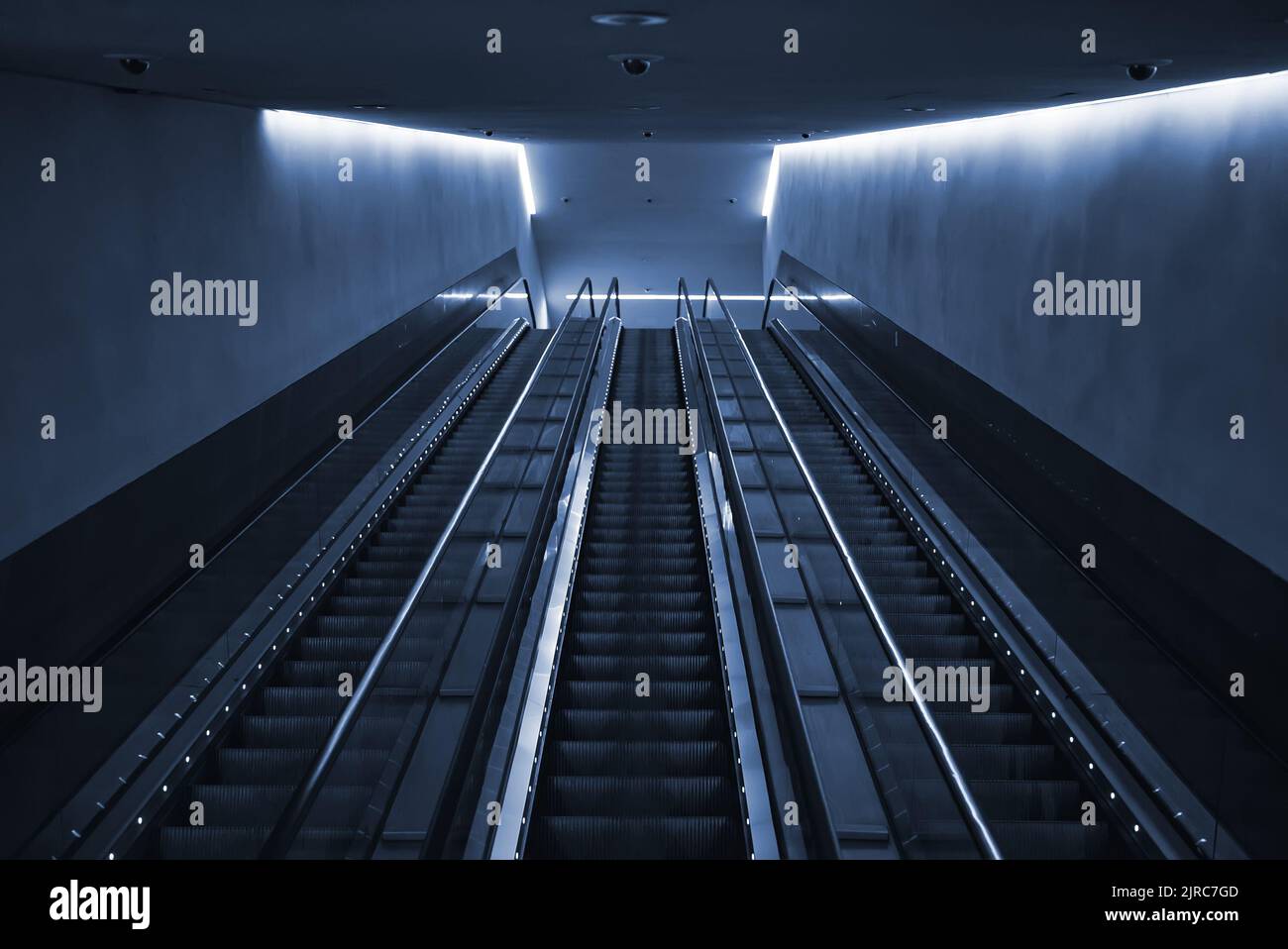 Electric escalator in metro. Moving staircase Stock Photo - Alamy