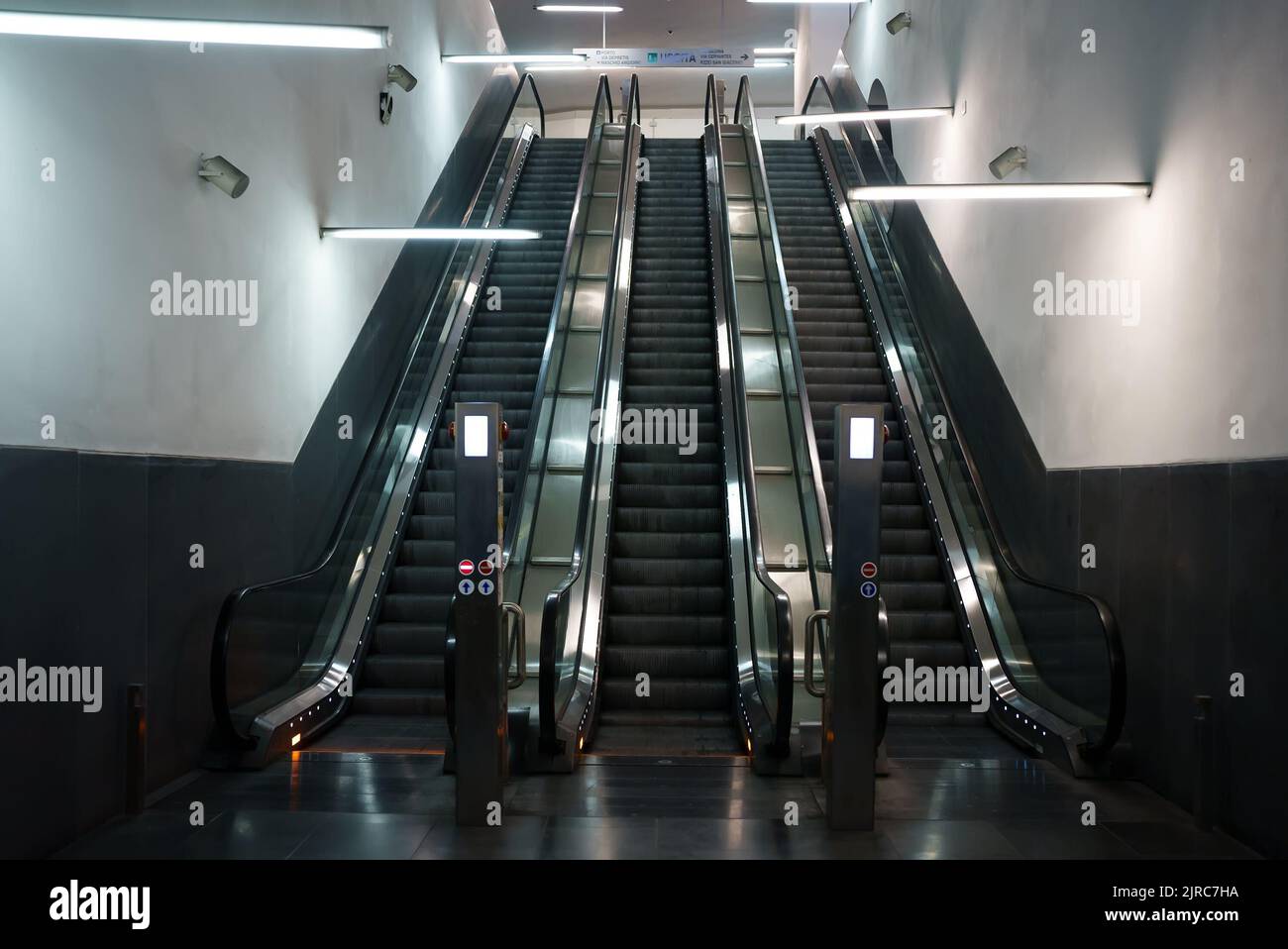 Electric escalator in metro. Moving staircase Stock Photo - Alamy