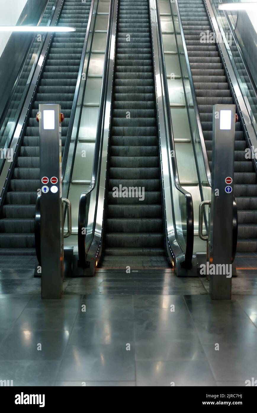 Electric escalator in metro. Moving staircase Stock Photo - Alamy