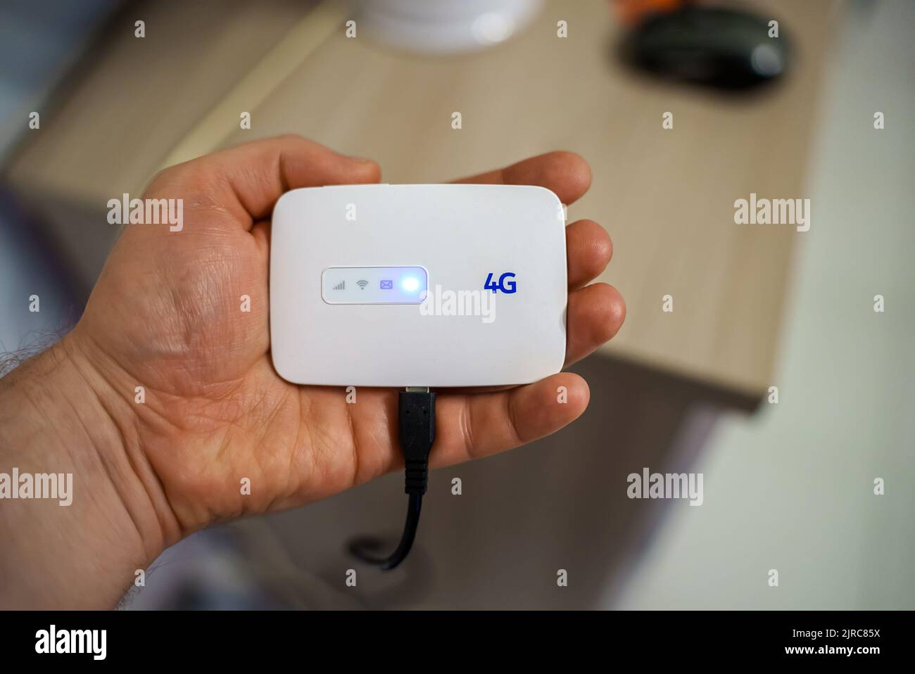 Modern wireless pocket 4g wifi modem Stock Photo - Alamy