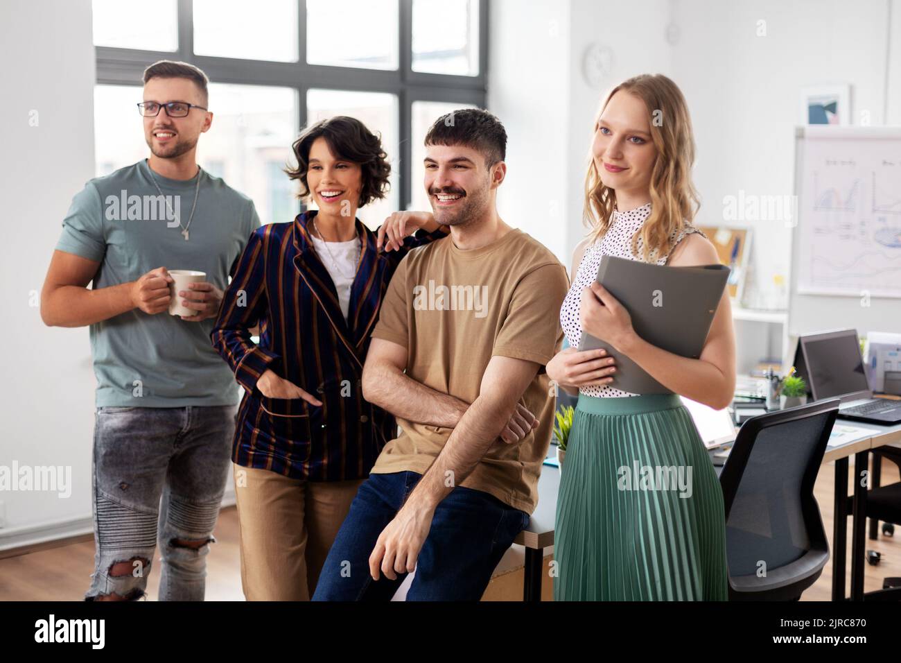 happy business team at office Stock Photo - Alamy